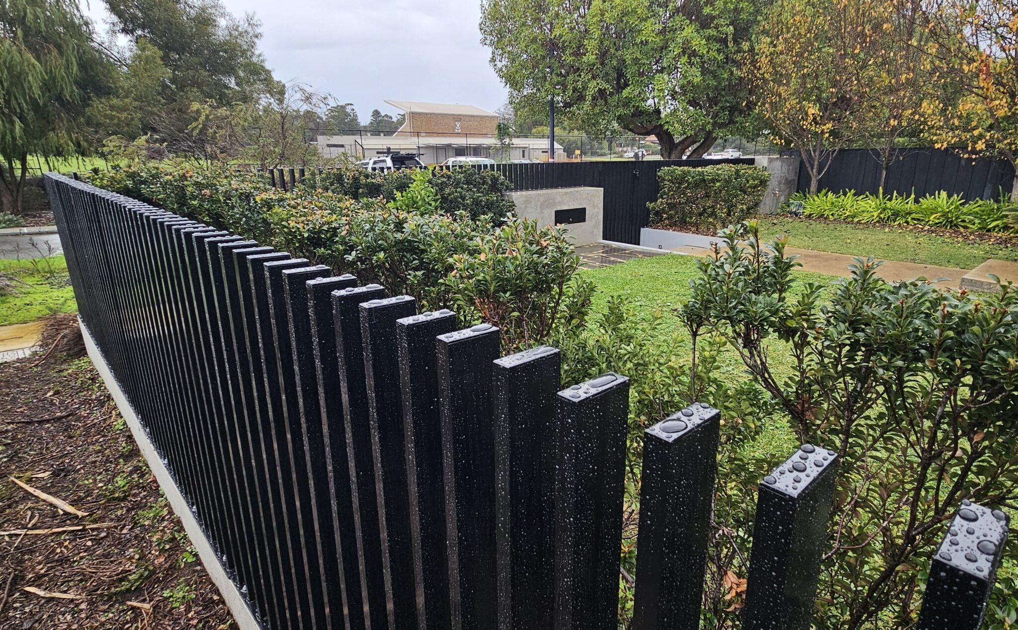 Precision Meets Design: Swanbourne Coastal Custom Steel Batten Fence ...